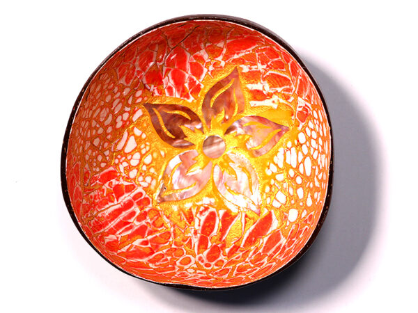 Red coconut bowl. Flower. Golden background. | Olé Mosaic
